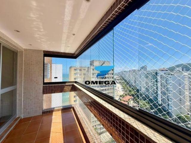 Apartamento à venda na praia das Pitangueiras no Guarujá I Omega Imoveis