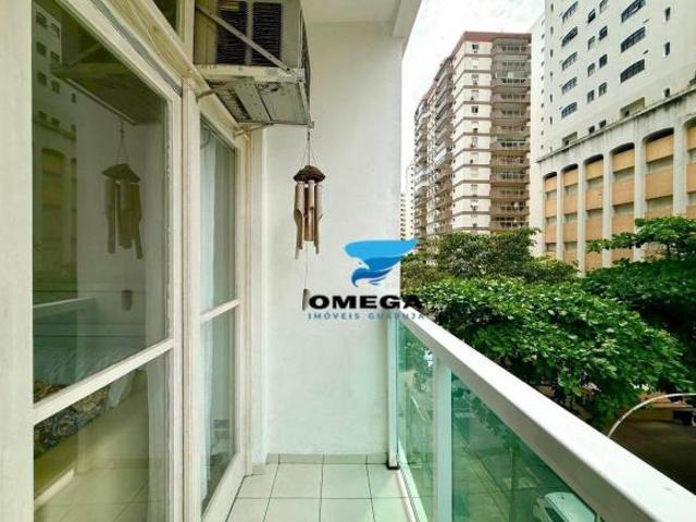 Apartamento à venda na praia das Pitangueiras no Guarujá I Omega Imoveis