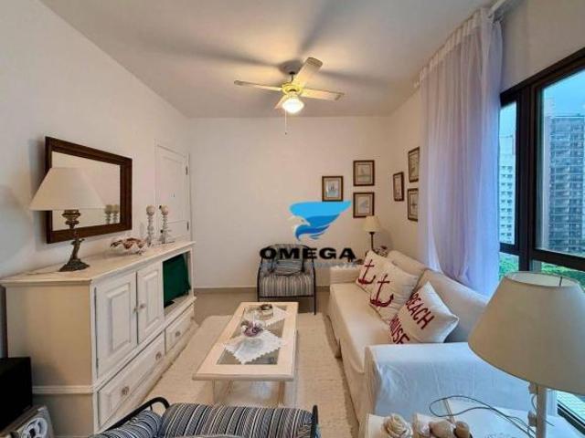 Apartamento à venda na praia das Pitangueiras no Guarujá I Omega Imoveis