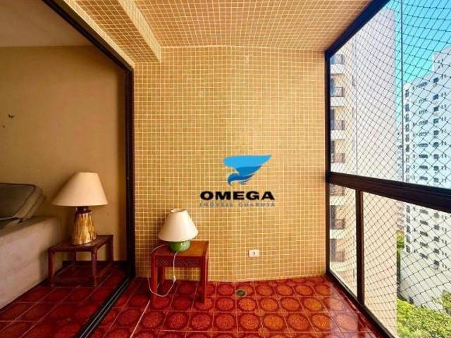 Apartamento à venda na praia das Pitangueiras no Guarujá I Omega Imoveis