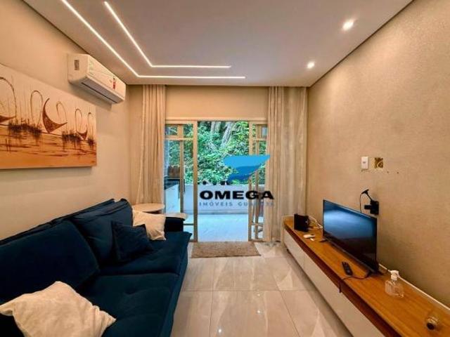 Apartamento à venda na praia das Pitangueiras no Guarujá I Omega Imoveis