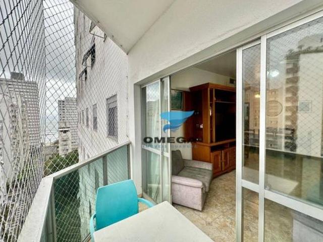 Apartamento à venda na praia das Pitangueiras no Guarujá I Omega Imoveis