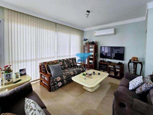 Apartamento à venda na praia das Pitangueiras no Guarujá I Omega Imóveis