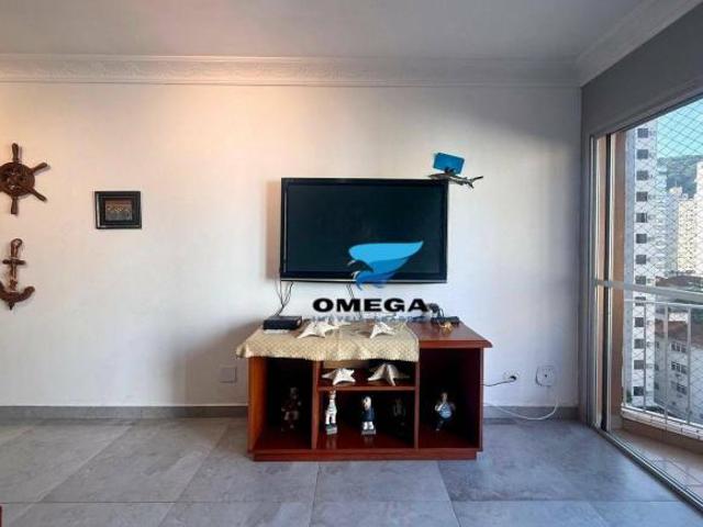 Apartamento à venda na praia das Pitangueiras no Guarujá I Omega Imoveis