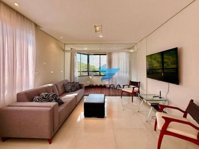 Apartamento à venda na praia das Pitangueiras no Guarujá I Omega Imoveis