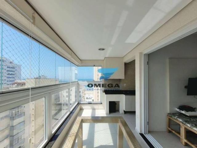 Apartamento à venda na praia das Pitangueiras no Guarujá I Omega Imoveis