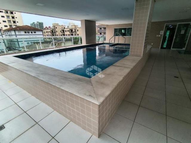 Apartamento a venda na praia grande, canto do forte, com 2 quartos, 1 suite e 1 vaga
