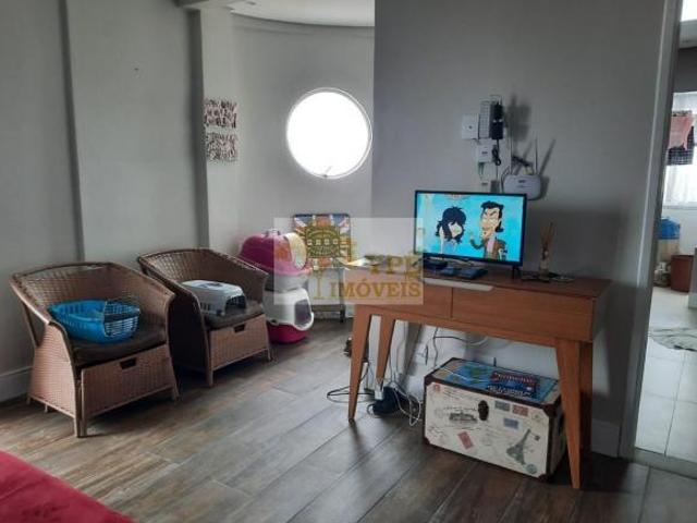 Apartamento à venda na Vila Atlântica em Mongaguá SP: 2 quartos, 1 suíte, 2 salas, 1 vaga de garagem
