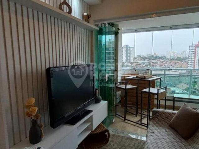 Apartamento à venda no bairro Vila Gumercindo com 2 dormitórios, varanda e 1 vaga