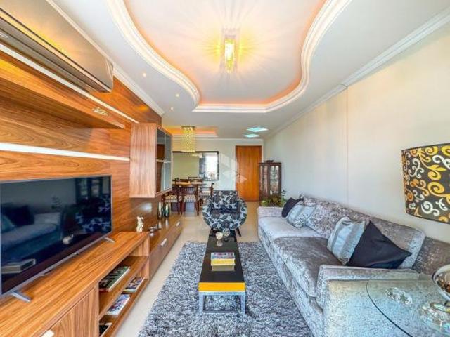 Apartamento à venda no bairro Marechal Rondon em Canoas, 3 dormitórios com suíte, sacada com churras