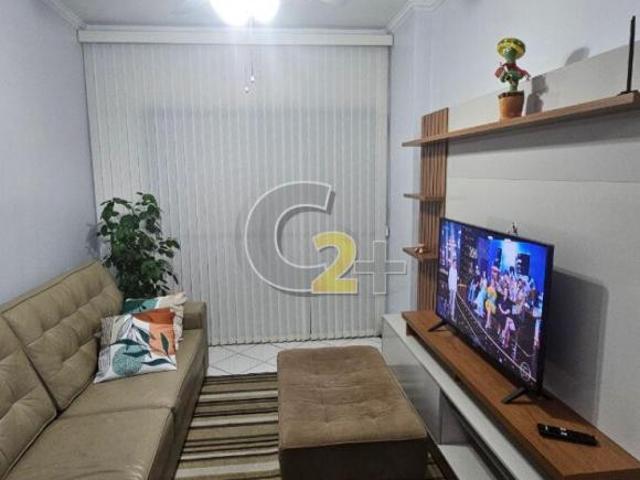 Apartamento à venda no Canto do Forte com 2 quartos, 1 suíte, 1 vaga