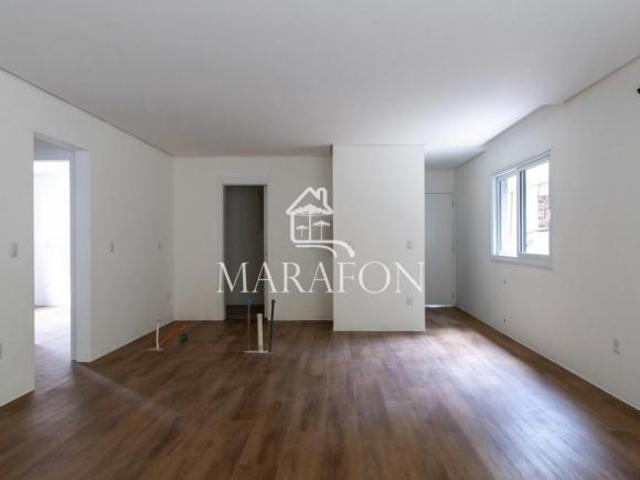 APARTAMENTO À VENDA NO CENTRO DE GRAMADO COM DUAS SUÍTES