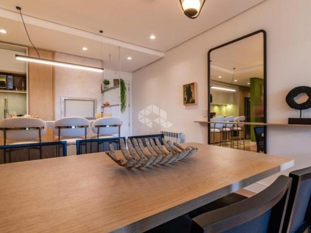 Apartamento à venda no Condomínio Bellagio Centro de Canela com 2 suítes, lavabo e 2 vagas