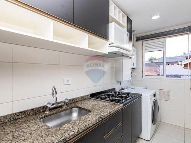 Apartamento à venda no Lindóia | 53m² | 2 quartos 1 suíte | sacada com churrasqueira | vaga cobert