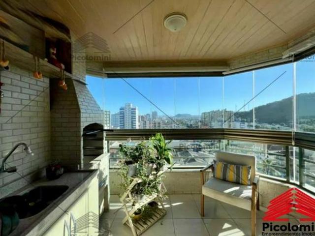Apartamento à venda,Centro de Monguagá, 90 m², varanda gourmet, frente para praia,02 quartos, 01 suí