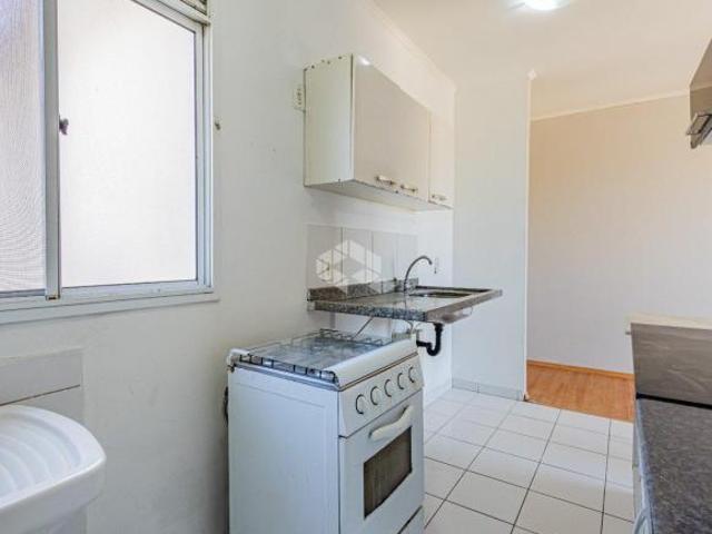 Apartamento à venda com 02 dormitórios / quartos e 01 box. Sacada. Ensolarado