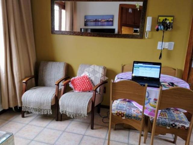 Apartamento à venda com 1 dormitório e 1 vaga de garagem no bairro Cidade Baixa
