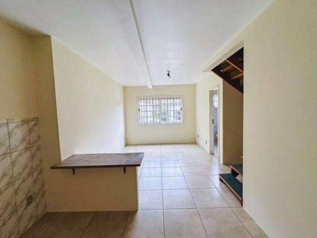 APARTAMENTO À VENDA COM 1 SUÍTE E GARAGEM