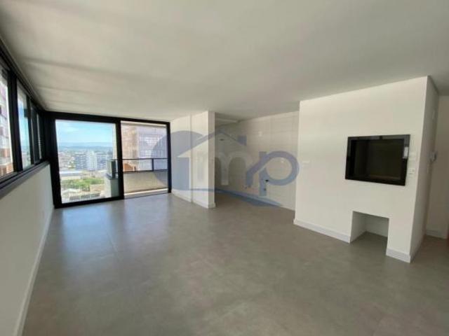 Apartamento a venda com 2 dormitorios no centro de Torres/RS