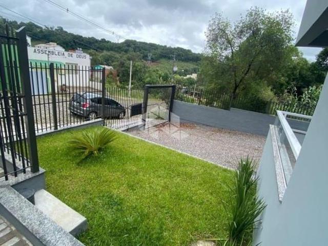 Apartamento à venda com 2 dormitórios, sacada com churrasqueira, 2 vagas, São Luiz, Caxias do Sul