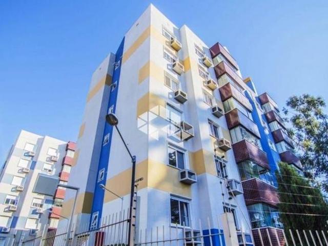 APARTAMENTO À VENDA COM 2 DORMITÓRIOS, 1 SUÍTE, SACADA E CHURRASQUEIRA