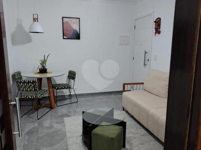 Apartamento à venda com 2 quartos e 1 vaga no Centro
