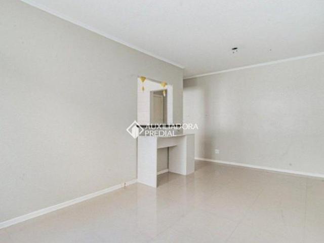 Apartamento à venda com 3 dormitórios e uma vaga no bairro Auxiliadora, Porto Alegre / RS