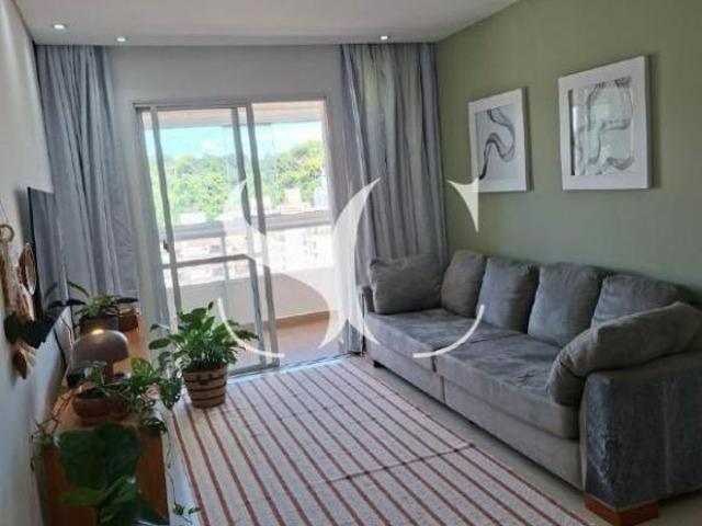Apartamento a venda com três dormitórios em São Vicente