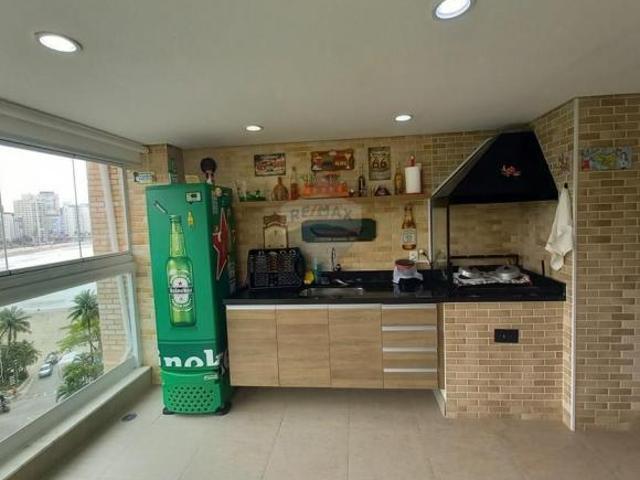 Apartamento à venda com varanda gourmet, 3 dorm e 2 vagas na Praia das Astúrias, no Guarujá, SP