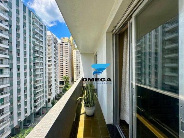 Apartamento à venda com vista mar na Praia das Pitangueiras no Guarujá | Omega Imóveis