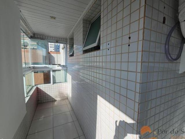 Apartamento a venda com suíte e lazer completo a venda em Praia Grande