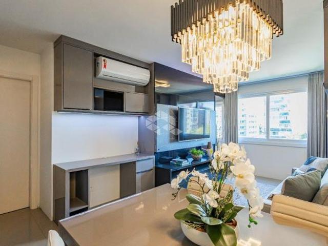 Apartamento à venda de 1 dormitório com SUÍTE, 54m² e 2 vagas cobertas, no bairro Três Figueiras em