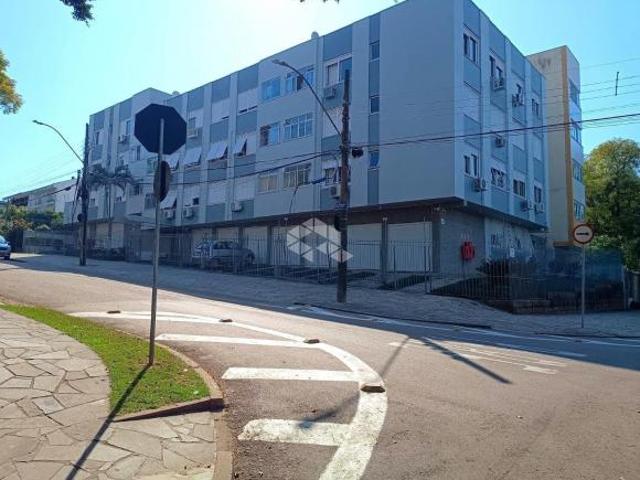 Apartamento à venda de 2 dormitórios, living amplo, cozinha americana