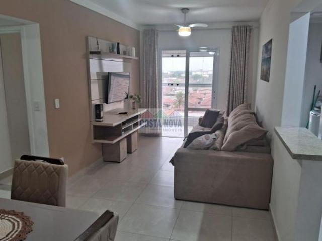 Apartamento à venda de 65m² Vista lateral frente mar Caiçara Praia Grande SP