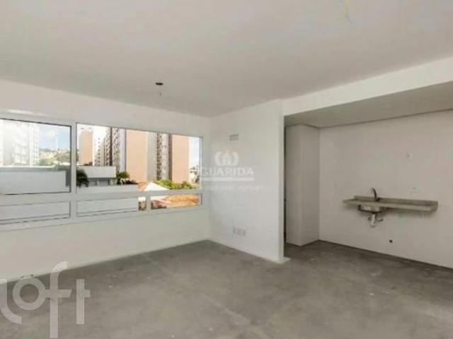 Apartamento à venda em Menino Deus com 69 m², 2 quartos, 1 suíte, 1 vaga