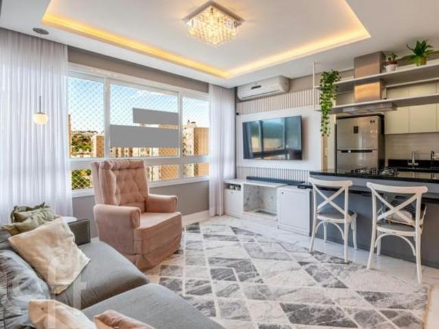 Apartamento à venda em Menino Deus com 75 m², 2 quartos, 1 suíte, 2 vagas