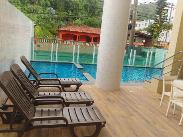 Apartamento á venda em Mongaguá com 02 dormitórios com sacada com vista mar