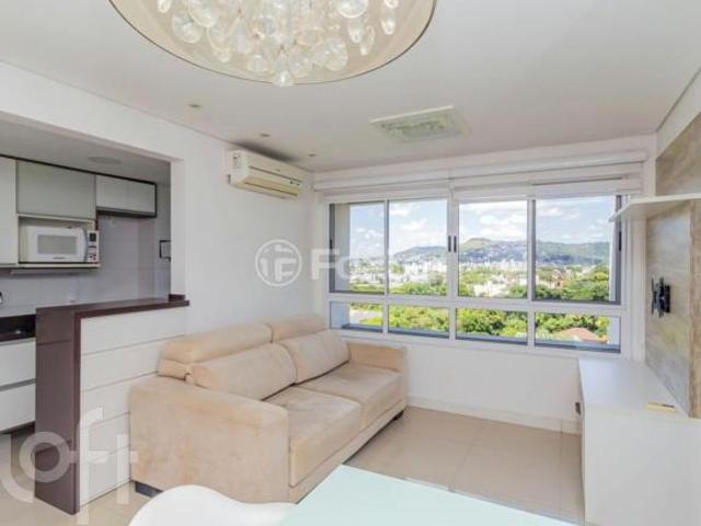 Apartamento à venda em Camaquã com 54 m², 2 quartos, 1 suíte, 1 vaga