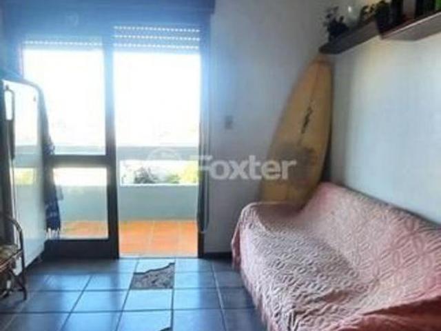 Apartamento à venda em Capão Novo com 43 m², 1 quarto, 1 vaga