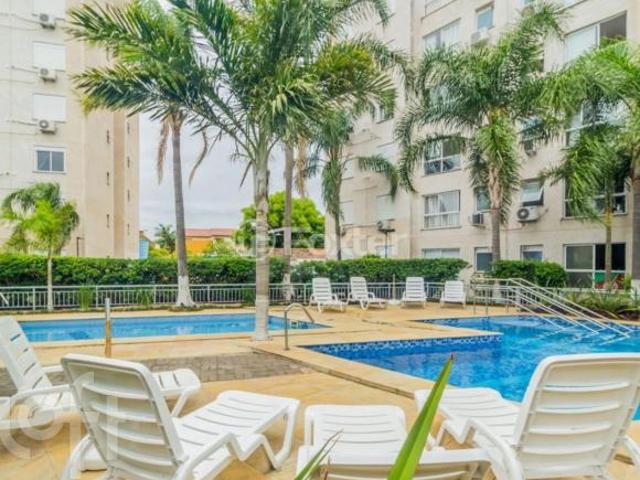 Apartamento à venda em Cavalhada com 56 m², 2 quartos, 1 suíte, 1 vaga