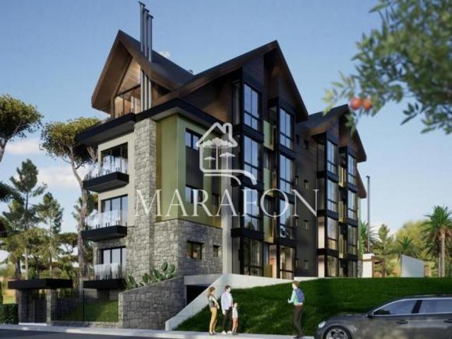 APARTAMENTO À VENDA EM GRAMADO COM DUAS SUÍTES