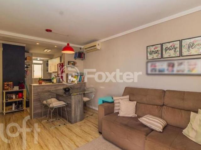 Apartamento à venda em Lomba do Pinheiro com 49 m², 2 quartos, 1 vaga