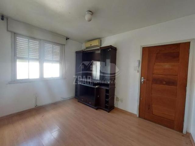 Apartamento à venda em Porto Alegre Santo Antônio: 2 dorms, 1 sala, 1 banheiro, 1 vaga de garagem