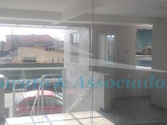 Apartamento à venda em Praia Grande SP, bairro Caiçara: 2 quartos, 1 suíte, 1 sala, 2 banheiros, gar