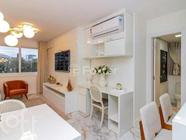 Apartamento à venda em Três Figueiras com 54 m², 1 quarto, 1 suíte, 2 vagas