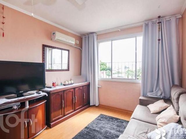 Apartamento à venda em Vila Ipiranga com 58 m², 2 quartos, 1 vaga