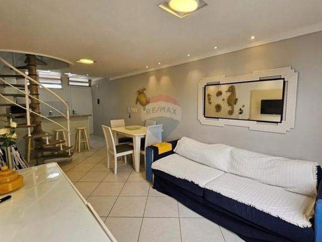 Apartamento à venda Guarujá Praia do Tombo 2 quartos Quadra da praia Lazer completo