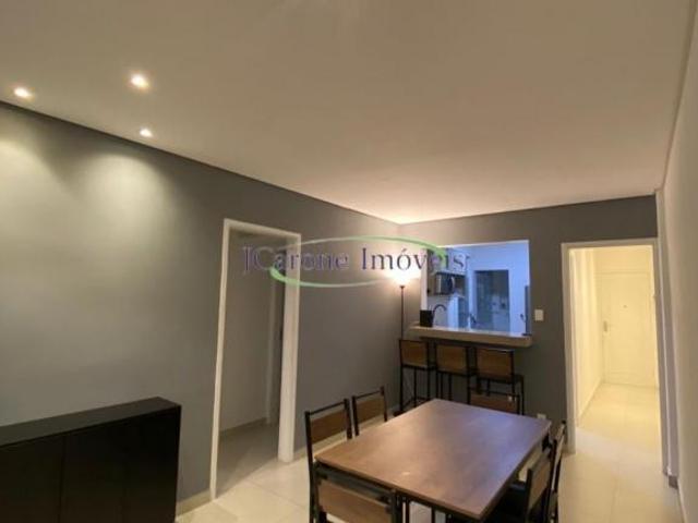 Apartamento a venda Reformado e mobiliado com 2 quartos na Quadra da Praia do Boqueirão em Santos /
