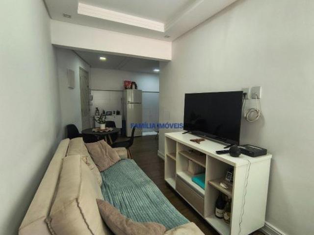 Apartamento à venda 1 quarto térreo frente mar Pompéia Santos/SP