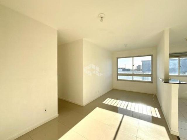Apartamento a venda, 2 dorimitórios, sala, cozinha com churrasqueira, área de serviço e vaga de est